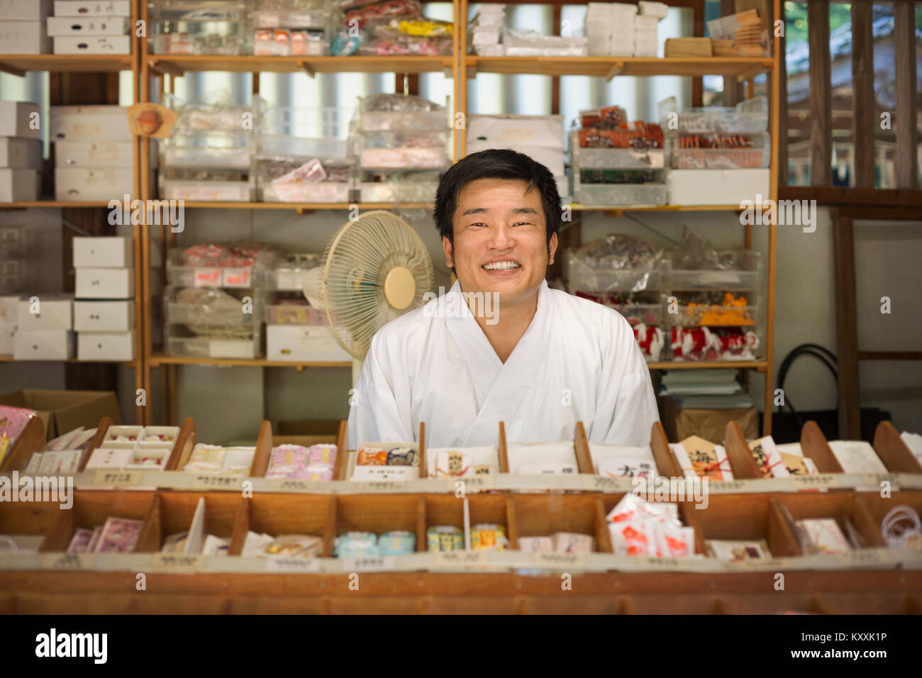 Salesman wearing white kimono at Shinto Sakurai Shrine, Fukuoka, Japan ...