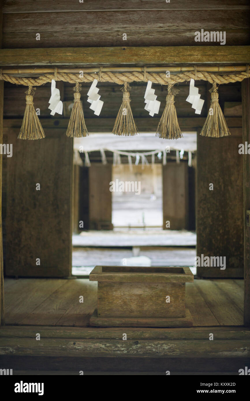 Shimenawa ropes decorating Shinto Sakurai Shrine, Fukuoka, Japan Stock ...