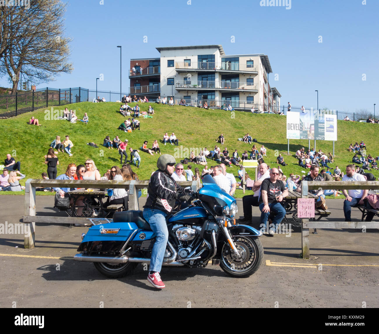 People enjoying a drink and spring sunshine near The Tyne Bar at ...