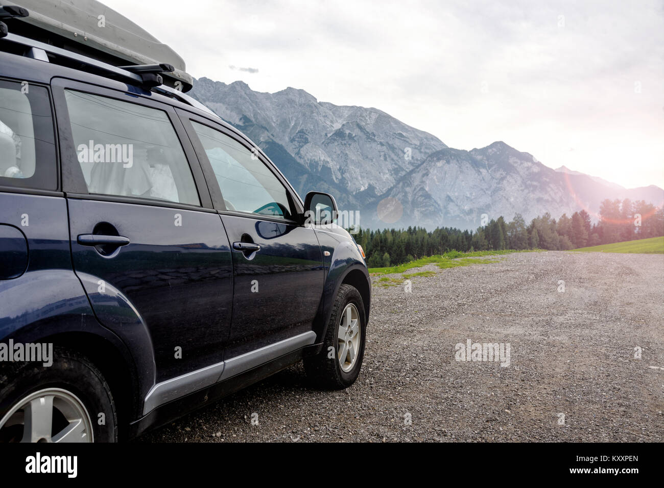 car for traveling with a mountain road Stock Photo - Alamy
