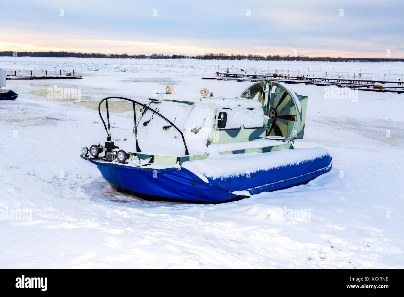 Hovercraft transporter on the ice of river in winter day Stock Photo ...