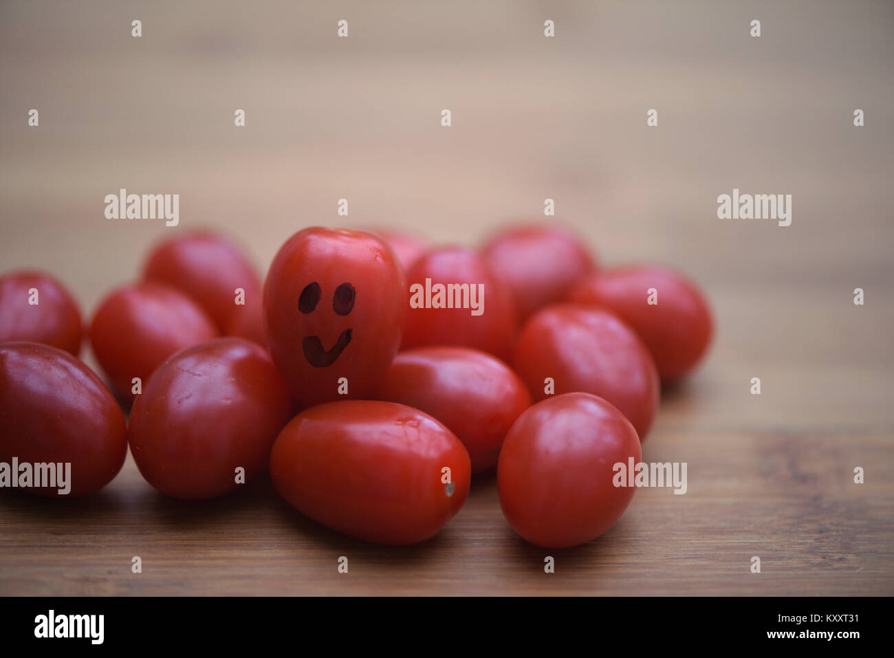 food photography image of healthy red juicy small mini plum tomatoes ...