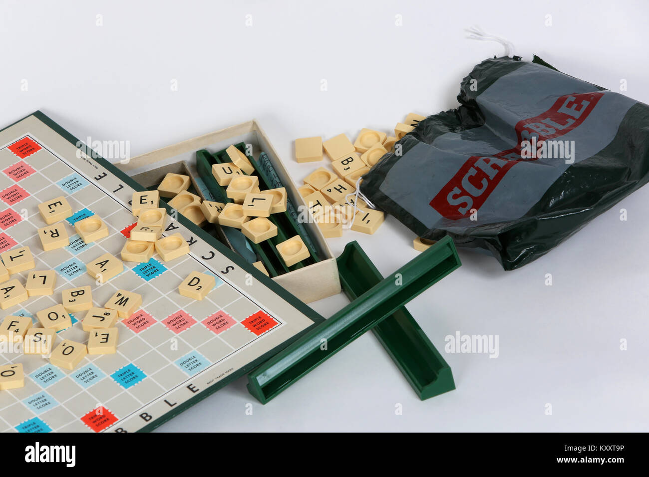 An old Scrabble game pictured shot on a white background in a studio in ...