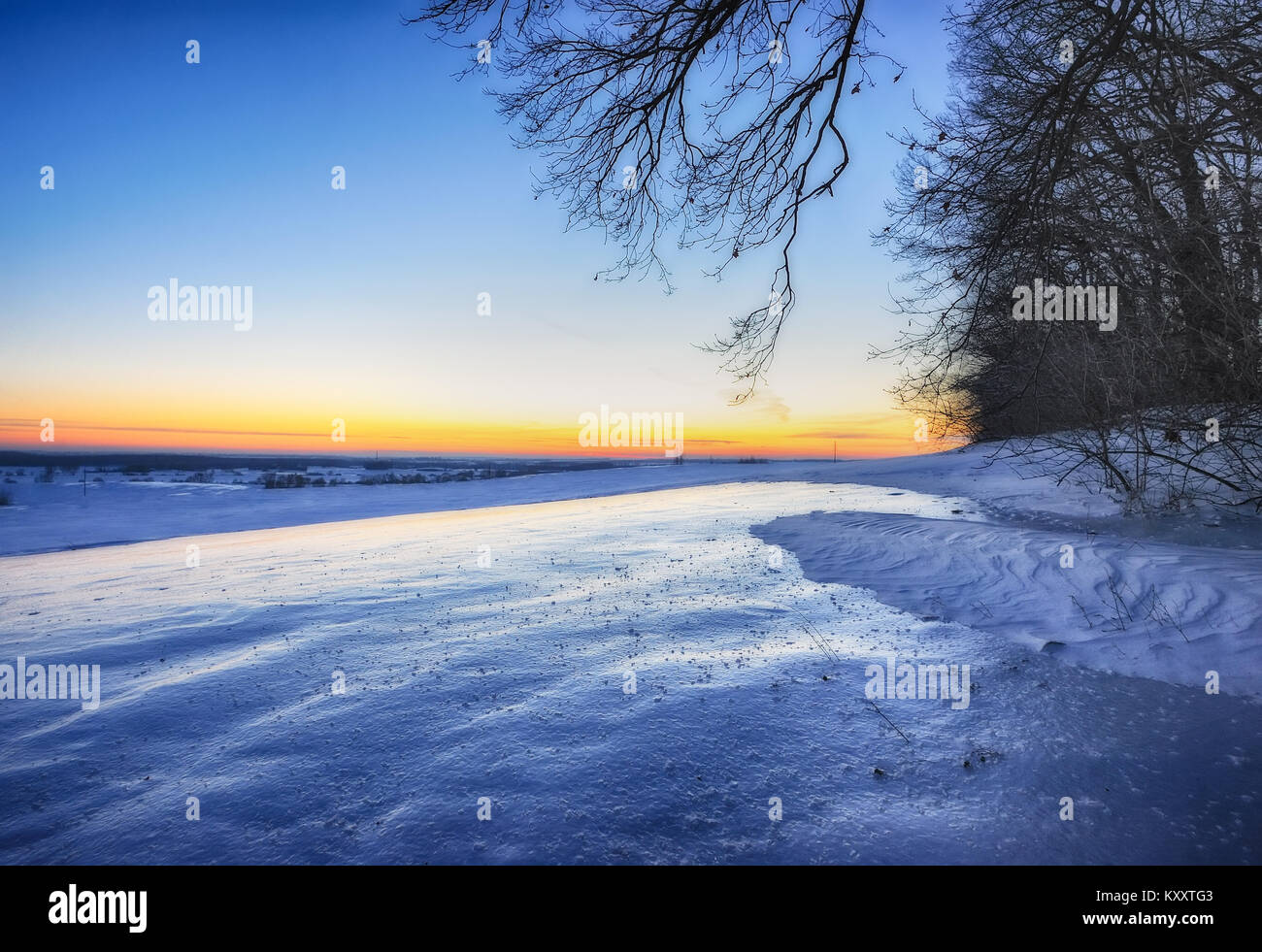 hilly field. picturesque winter sunrise Stock Photo - Alamy
