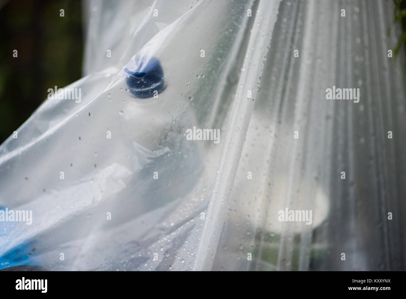 Full plastic trash bag hi-res stock photography and images - Alamy