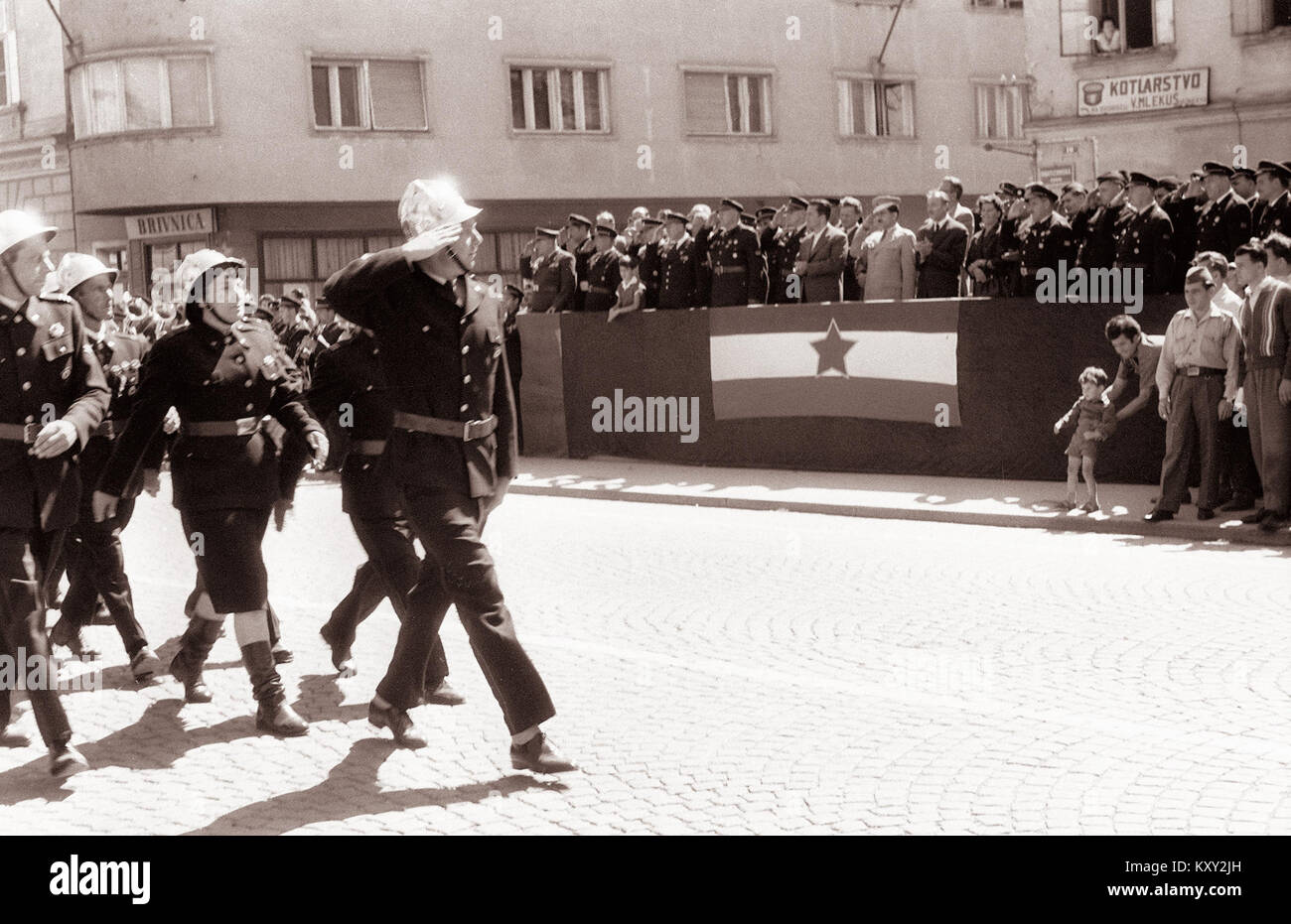 A 1961 photograph showing the firefighting parade marking the 90th ...