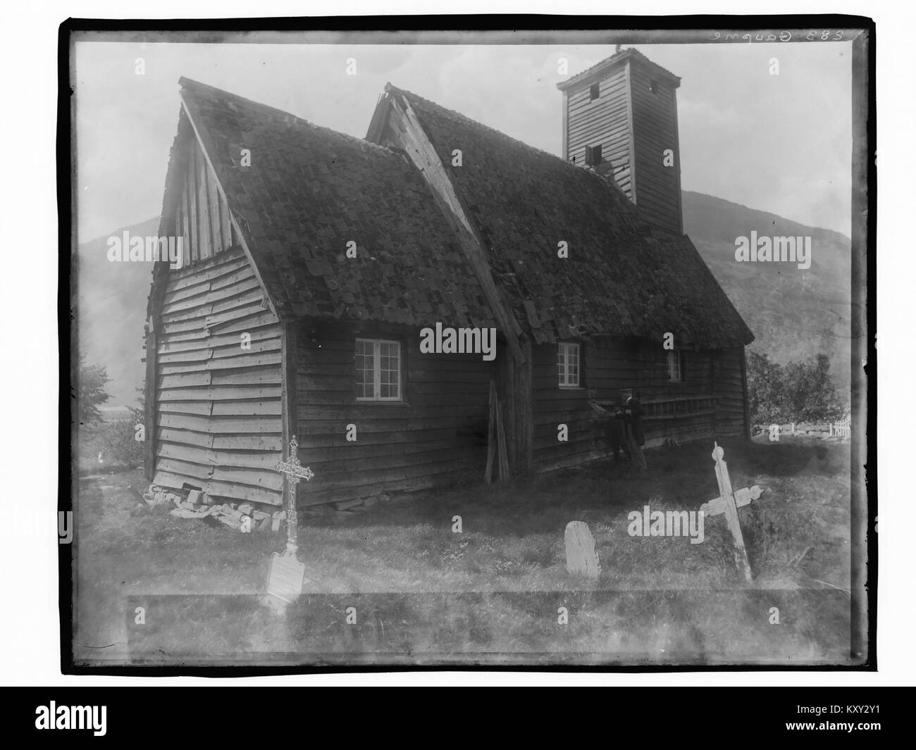 The photograph shows the exterior of Gaupne old church in Luster ...