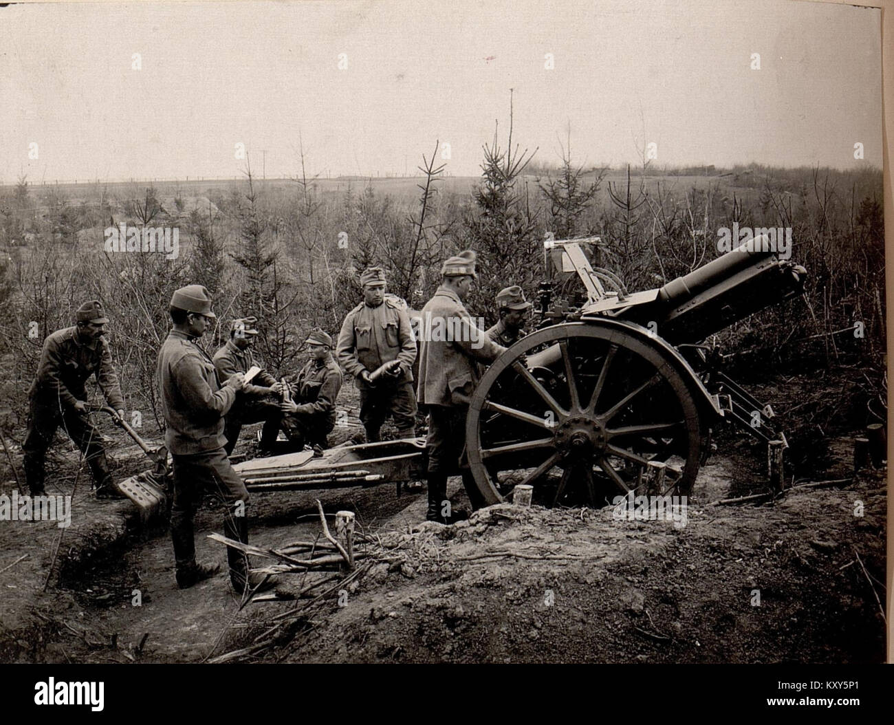 The image depicts a cannon in firing position, a historical ...