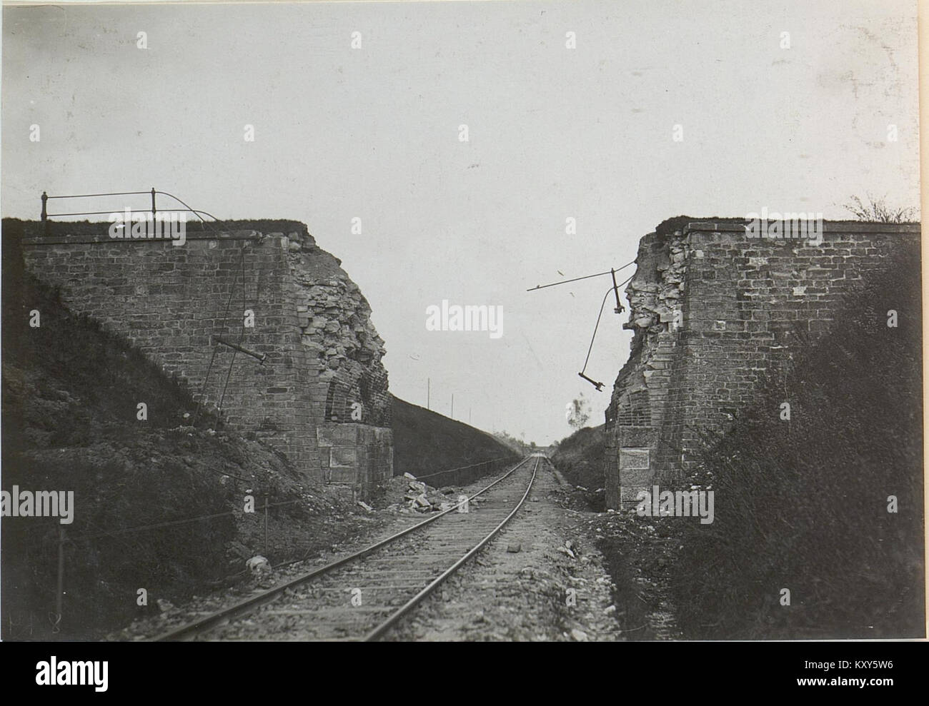 A destroyed railway bridge west of Jezierna, depicting the damage and ...