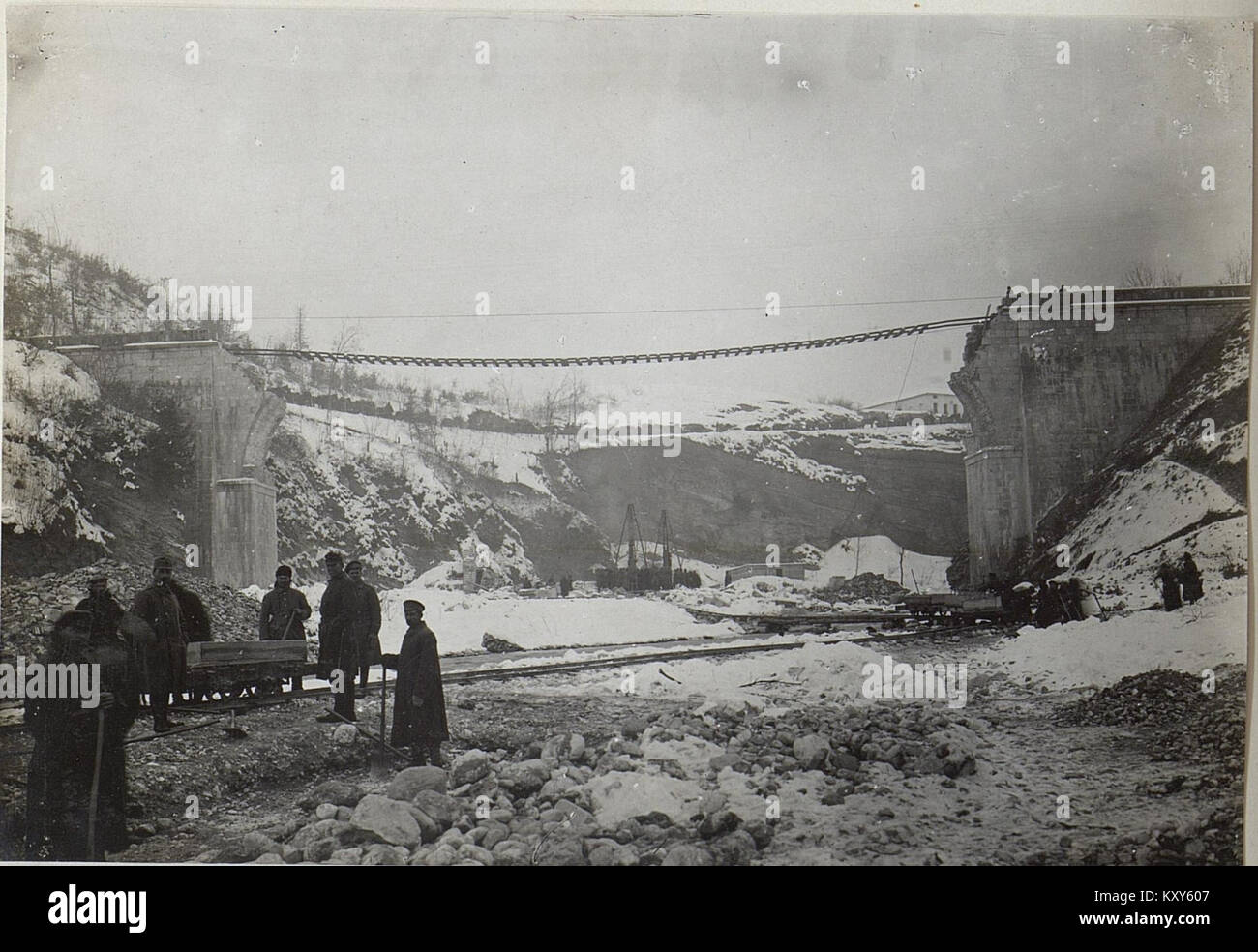 This photograph shows the destroyed railway bridge over the Piave River ...