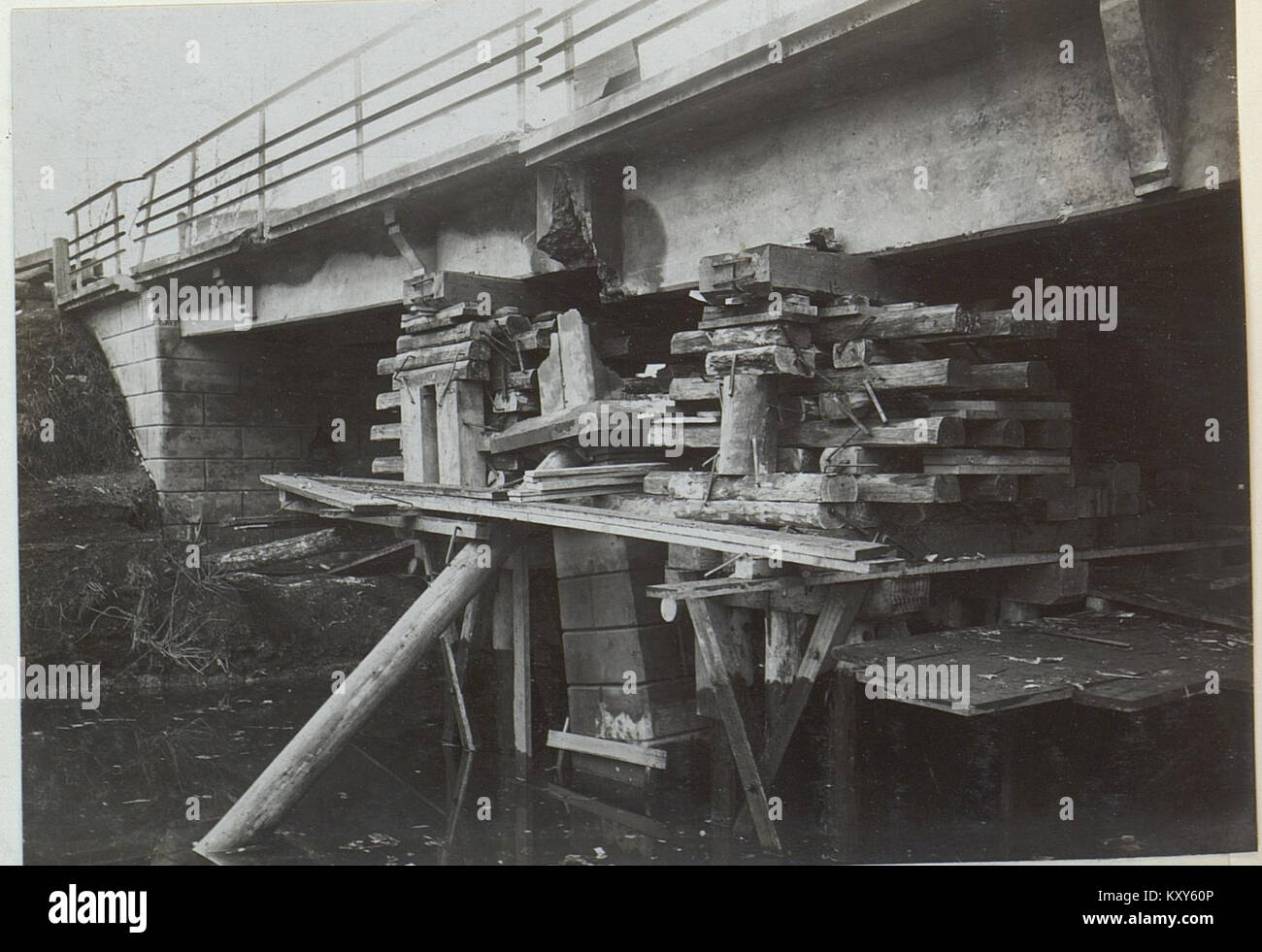 This image depicts the demolition of a reinforced concrete bridge in ...