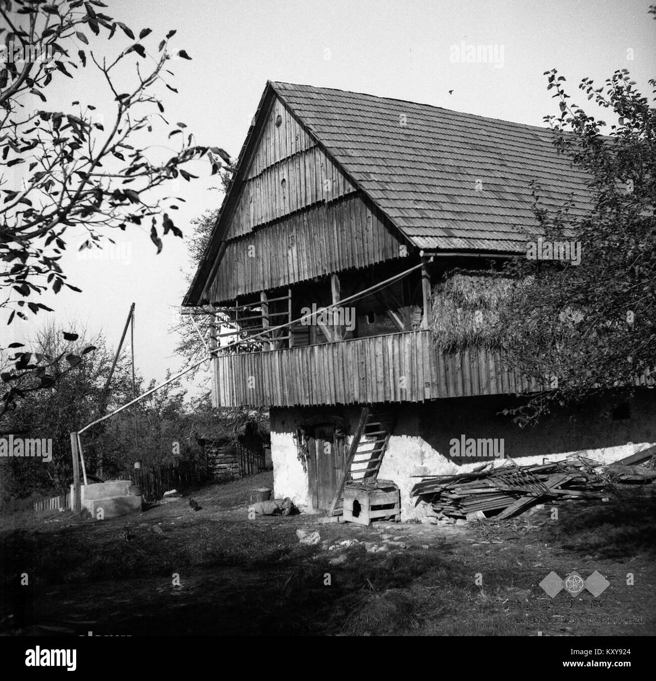 This 1951 photograph of Gorenje Zabukovje, Slovenia, shows a stone ...