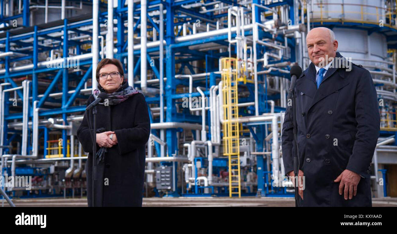 A photograph of Ewa Kopacz and Pawel Olechnowicz at the Gdansk Refinery ...