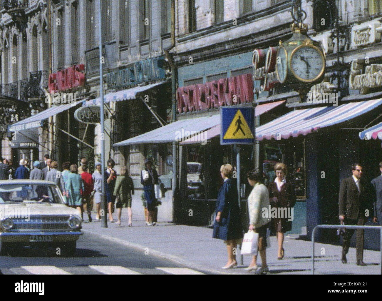 This 1966 photograph shows Hamngatan in Stockholm with the storefront ...