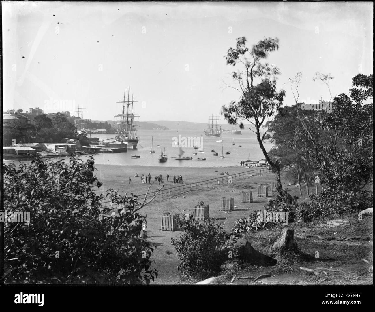 A photograph shows a harbour-side scene at Careening Cove in Kirribilli ...