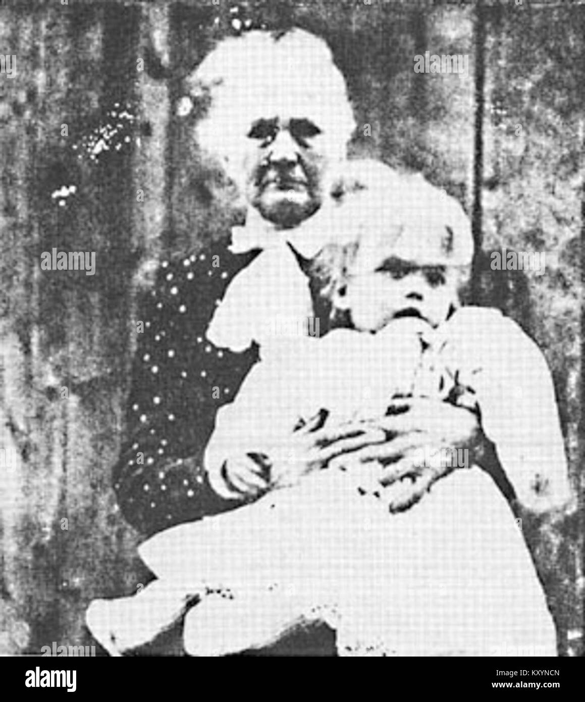 The photograph of Harriet Ansley Day and her grandchild captures a ...