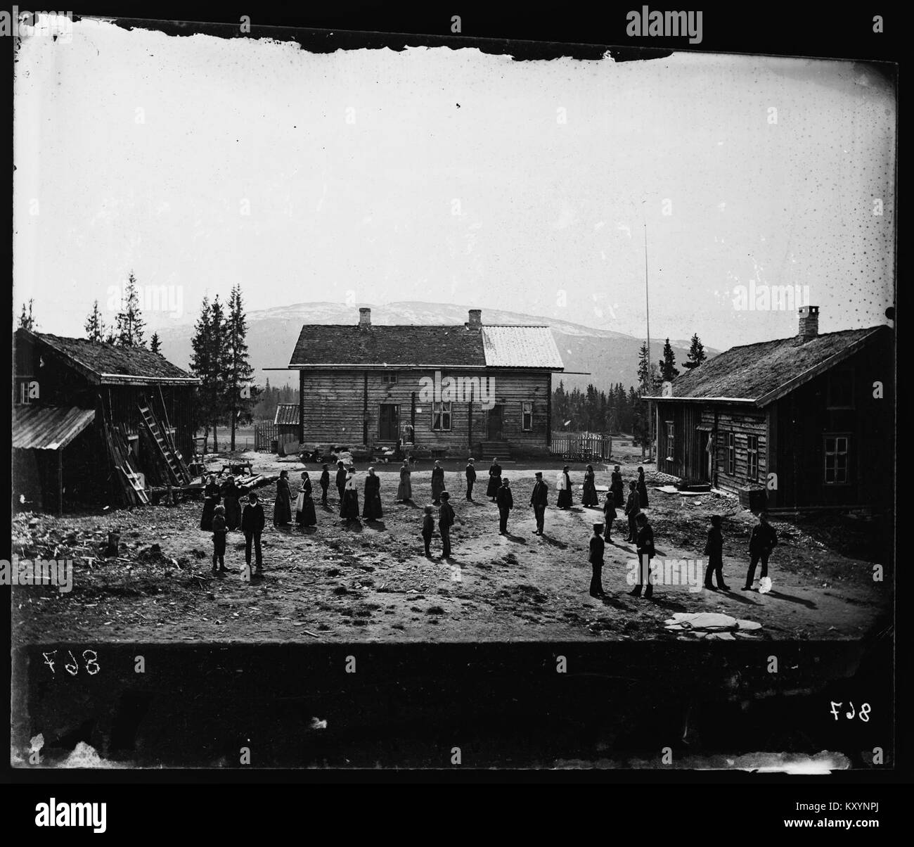 The photograph shows the Hattfjelldal New Parsonage (Nye Prestegård) in ...