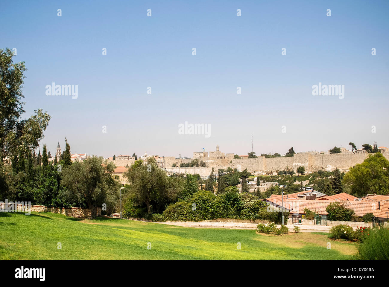Wide angle picture of green garden and trees outside the walls of the ...