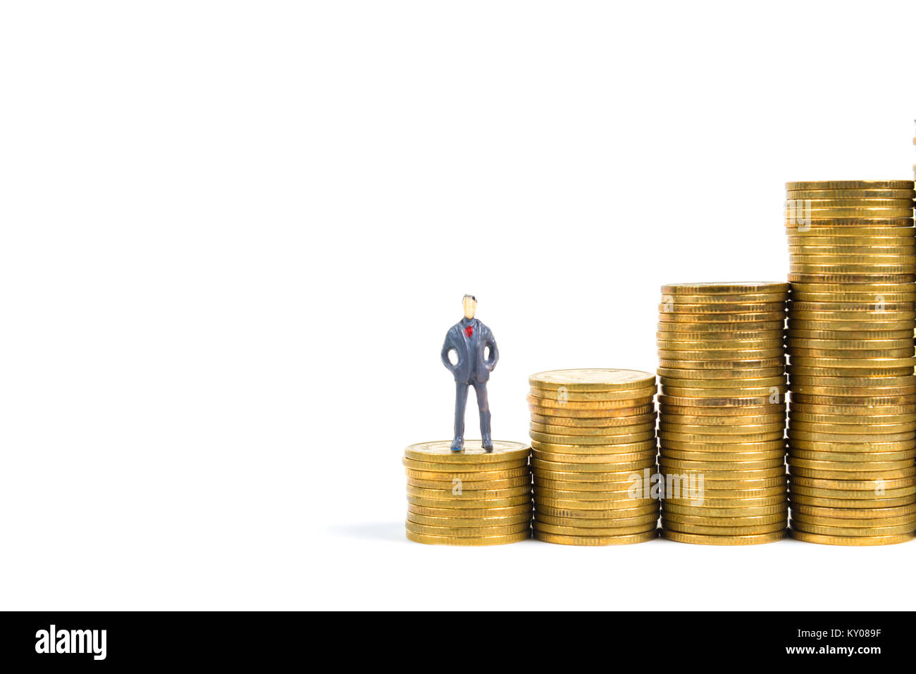 Figure miniature businessman or small people standing on first step of ...