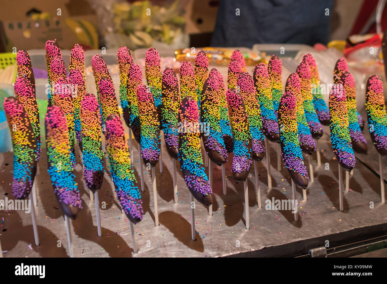 banana covered chocolate with colorful sugar ball stick very cute and ...