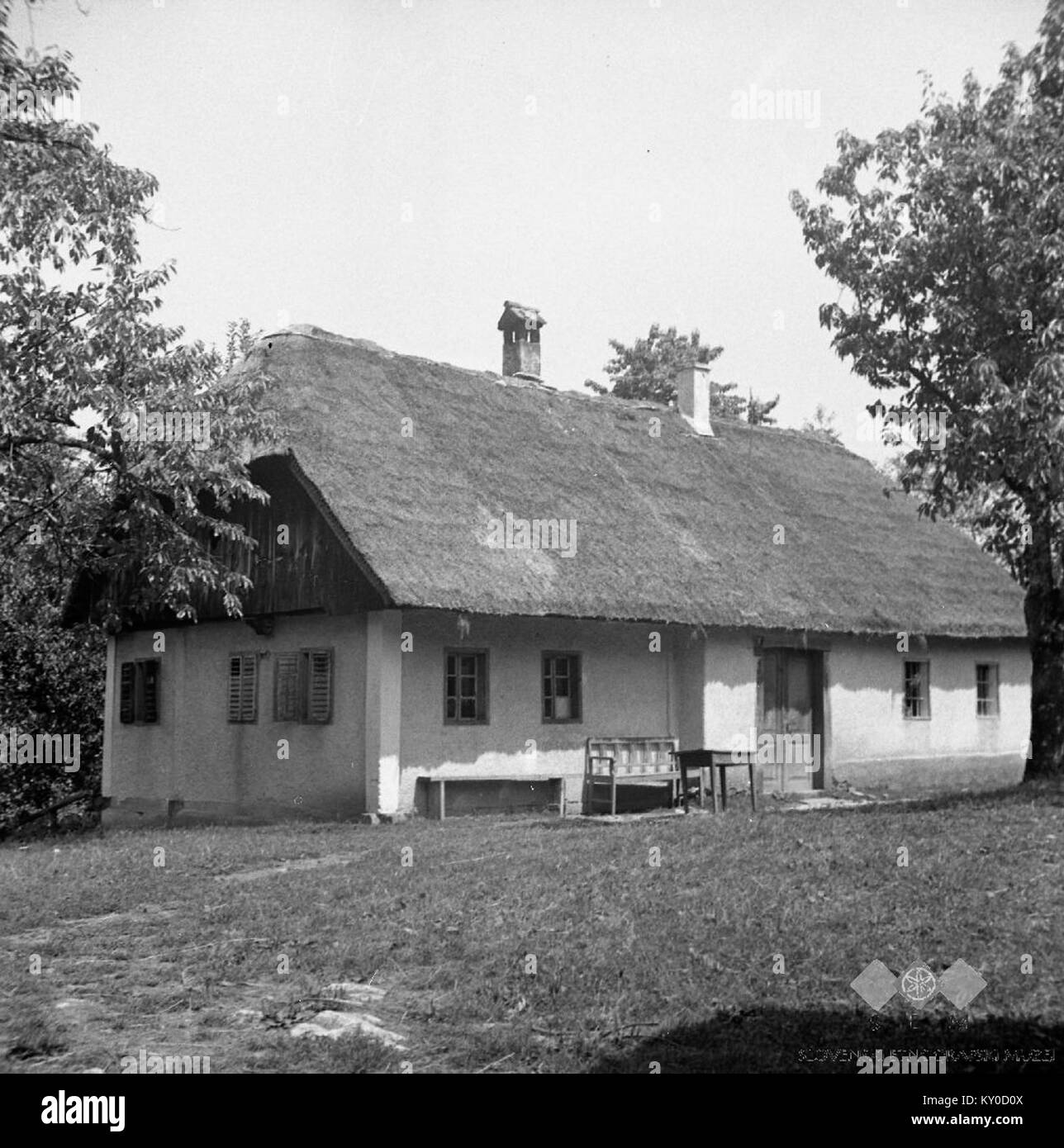 The photograph from 1956 depicts the house 'Hisa pri Palcarju' in ...