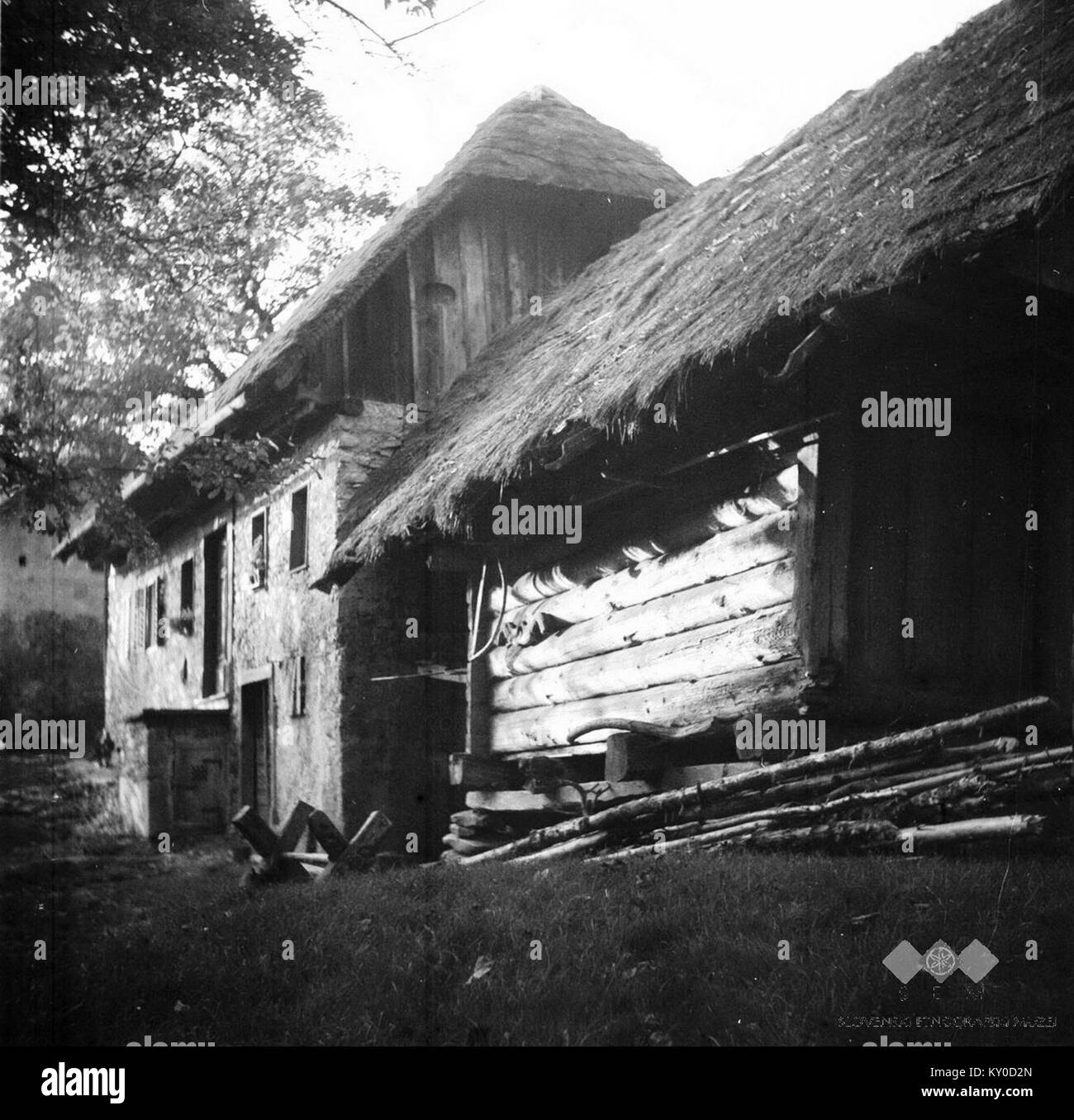 This photograph from 1948 shows a traditional house with a basement ...
