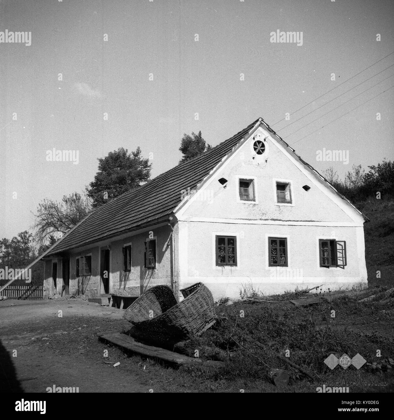 This photograph from 1951 depicts a renovated house in Martinja Vas ...