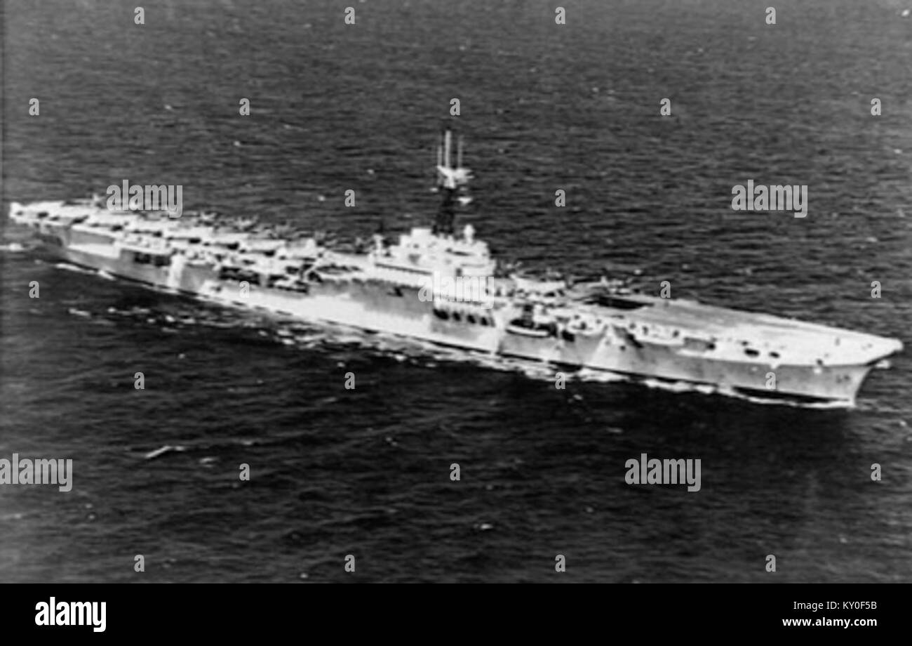 The image depicts HMS Glory (R62), a Royal Navy aircraft carrier, in ...