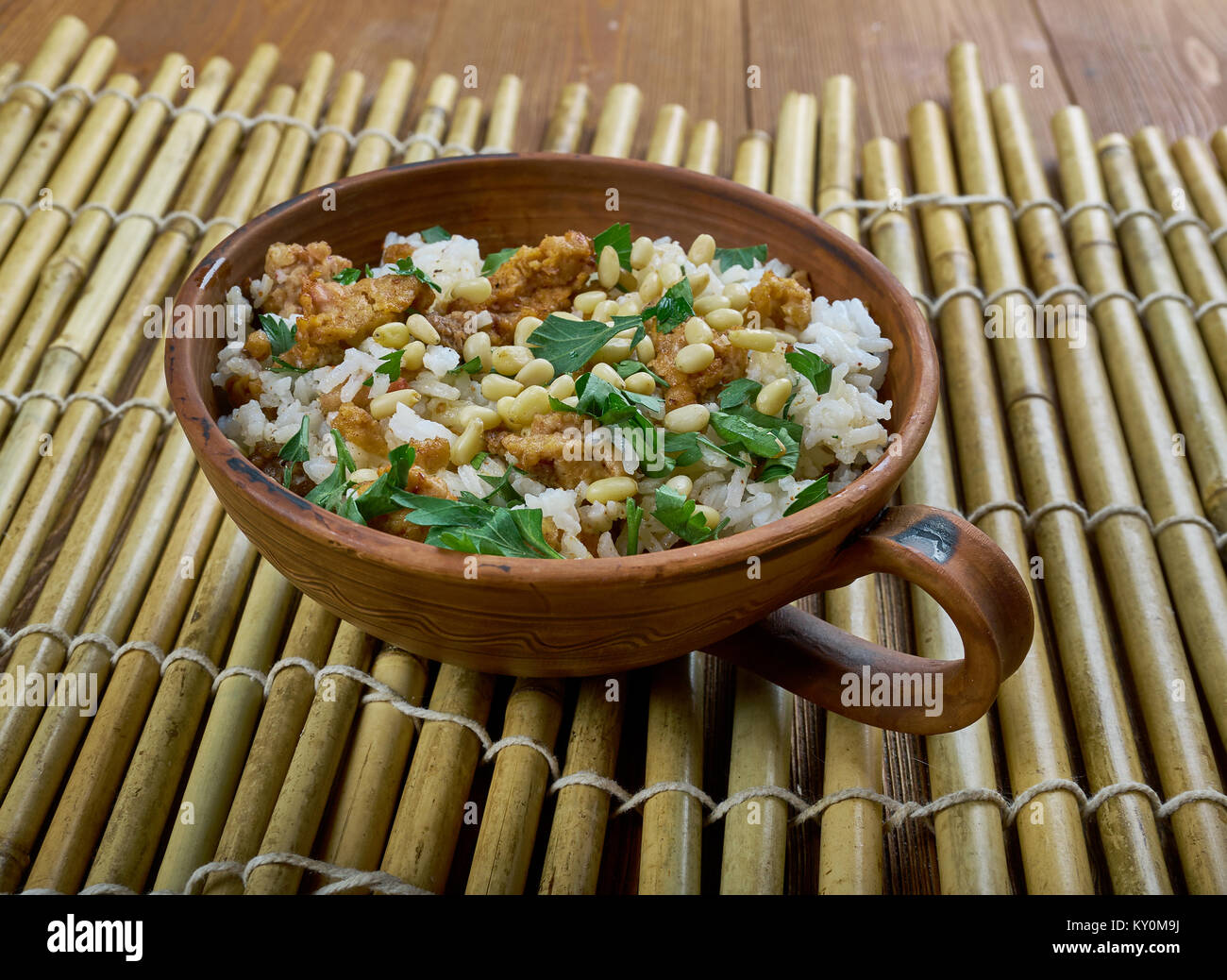 Lebanese Hushwee Rice with Toasted Pine Nuts Stock Photo - Alamy