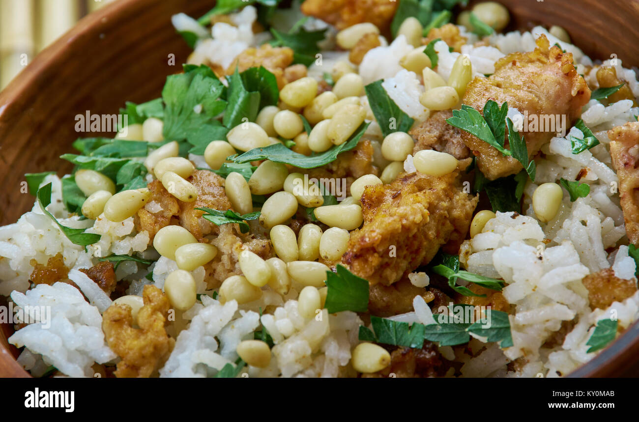 Lebanese Hushwee Rice with Toasted Pine Nuts Stock Photo - Alamy