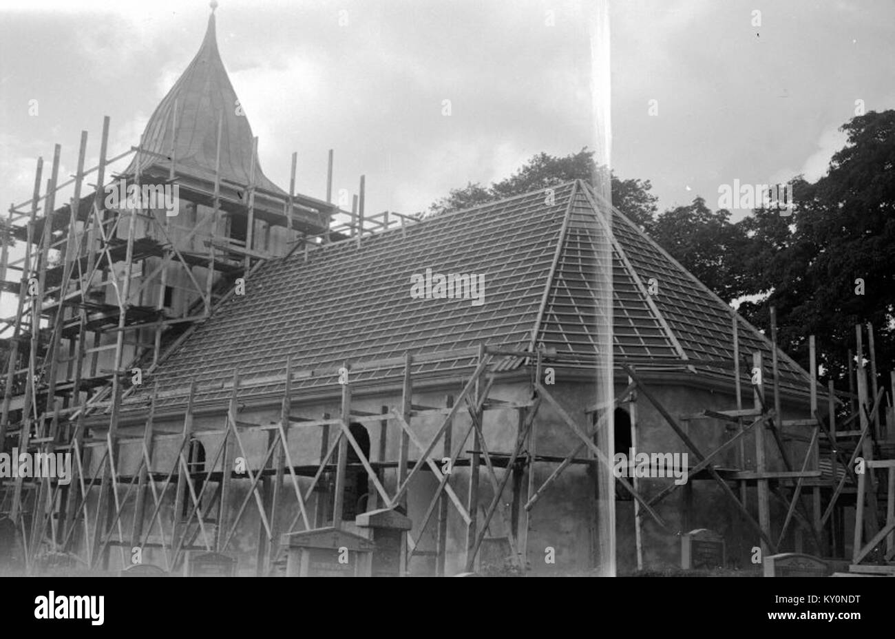 A photograph of Hölta Church in Sweden, showcasing its architectural ...