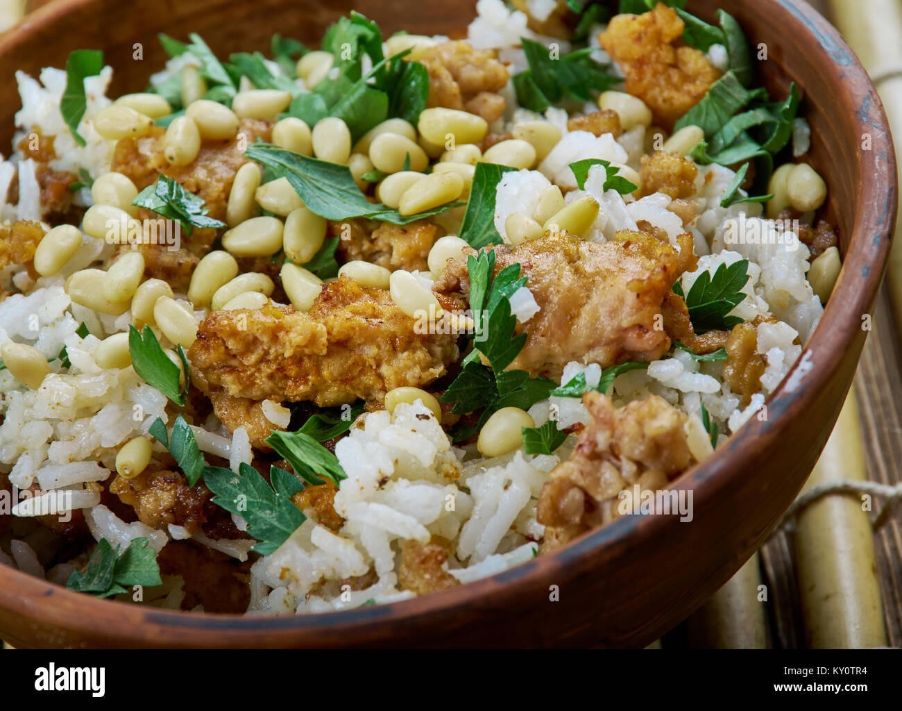 Lebanese Hushwee Rice with Toasted Pine Nuts Stock Photo - Alamy