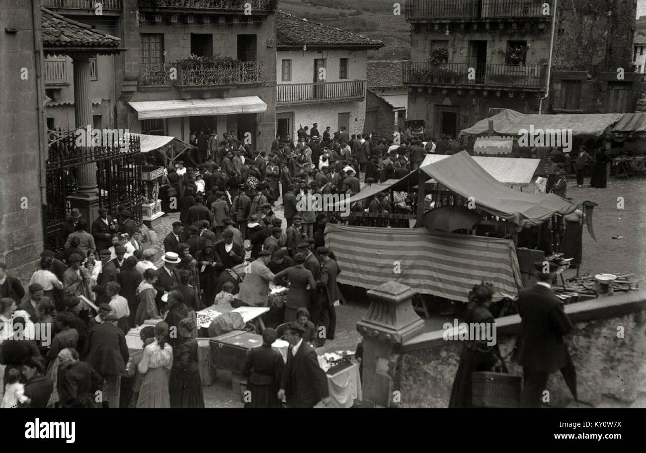 A lively agricultural fair in the town square of Lezo, Spain. The event ...