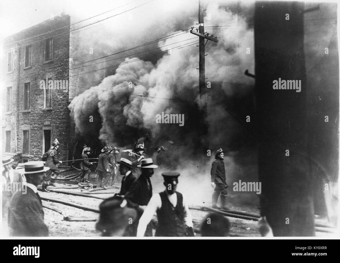 Firefighters are shown in action at Montreal Harbour in the 1920s ...