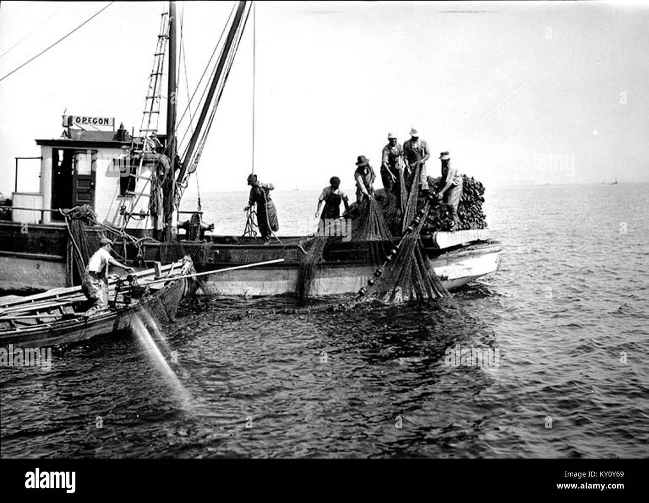 Hauling fish boat Black and White Stock Photos & Images - Alamy