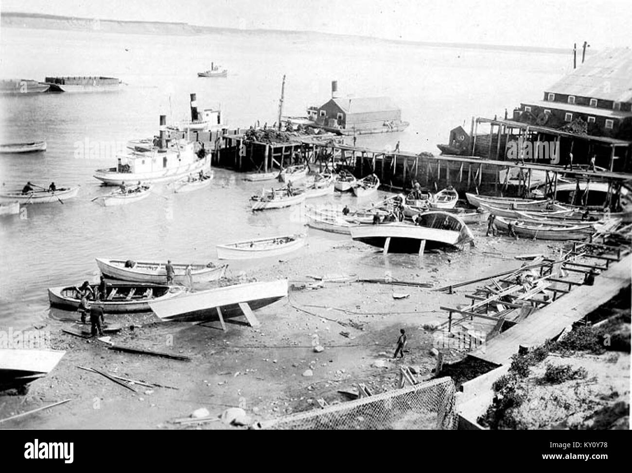 Fishing boats and dock at the Alaska Packers Association cannery ...
