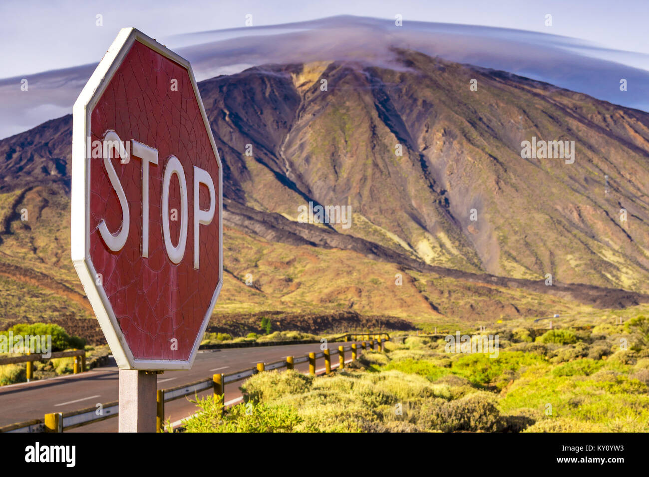 Stop sign in nature mountain landscape road Stock Photo - Alamy