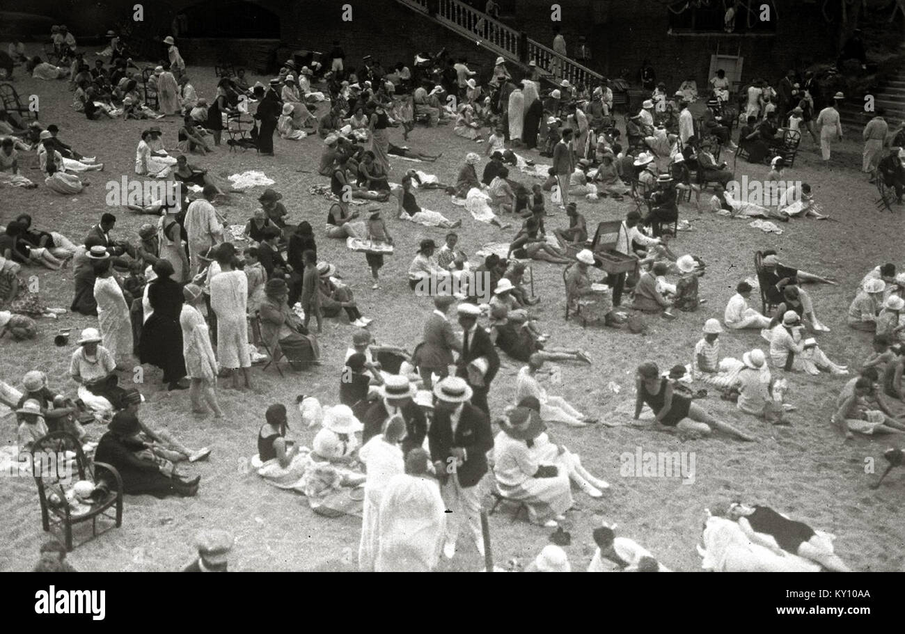 The image depicts scenes on a beach during a summer day, capturing the ...