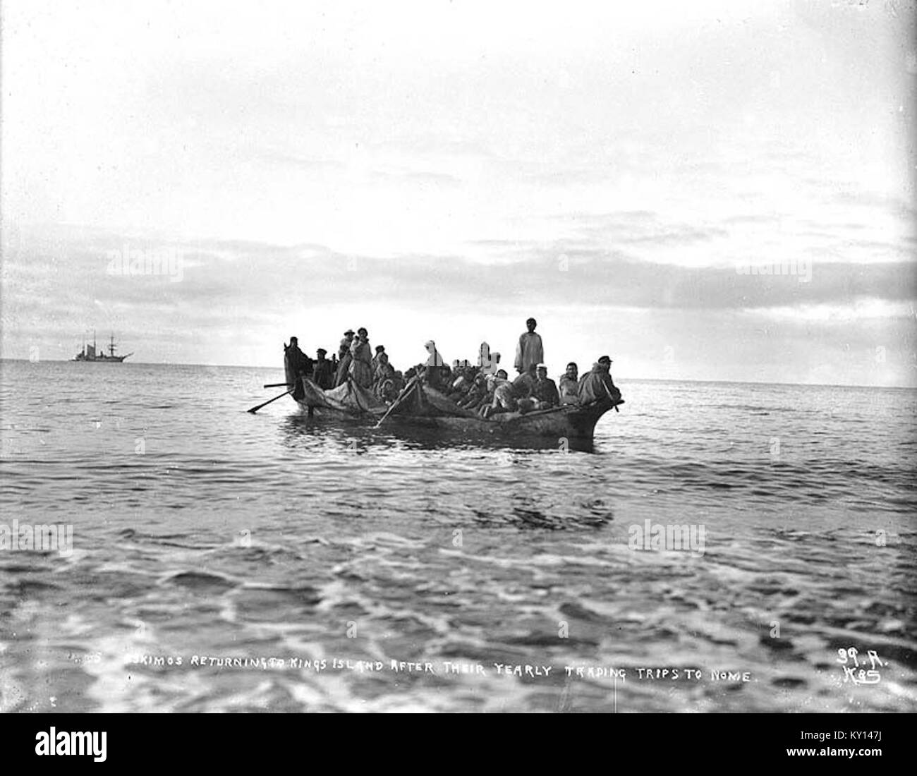 This early 20th-century photograph captures Eskimos returning to King ...