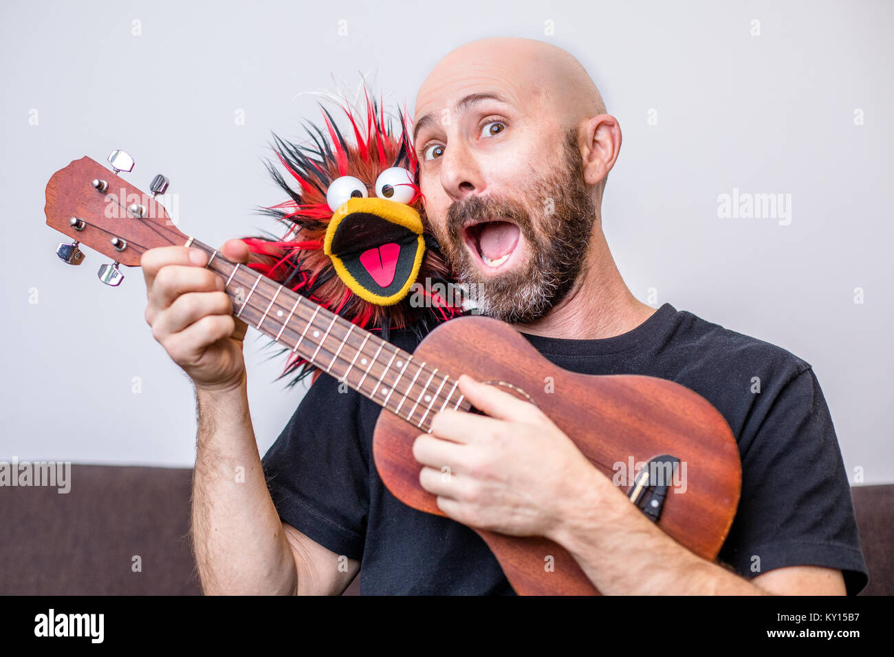 PORTRAIT OF SCHULTZ THE PUPPET AND BALD CAUCASIAN MAN WITH BEARD ...