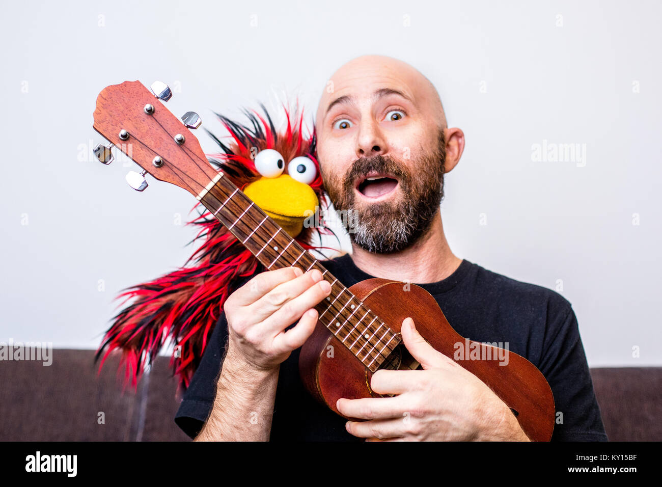 PORTRAIT OF SCHULTZ THE PUPPET AND BALD CAUCASIAN MAN WITH BEARD ...