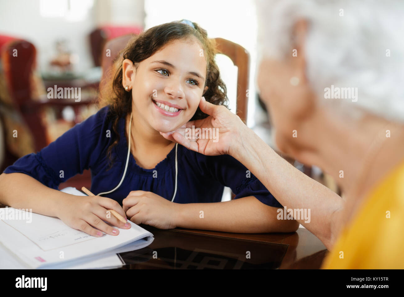 Girl helping elderly lady hi-res stock photography and images - Alamy