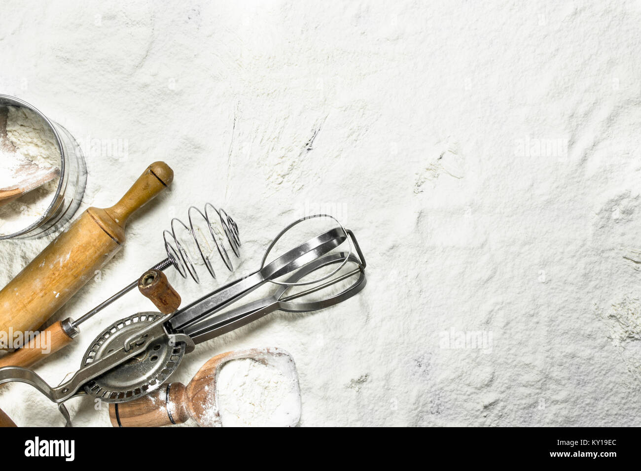 Various baking tools on flour. Top view Stock Photo - Alamy