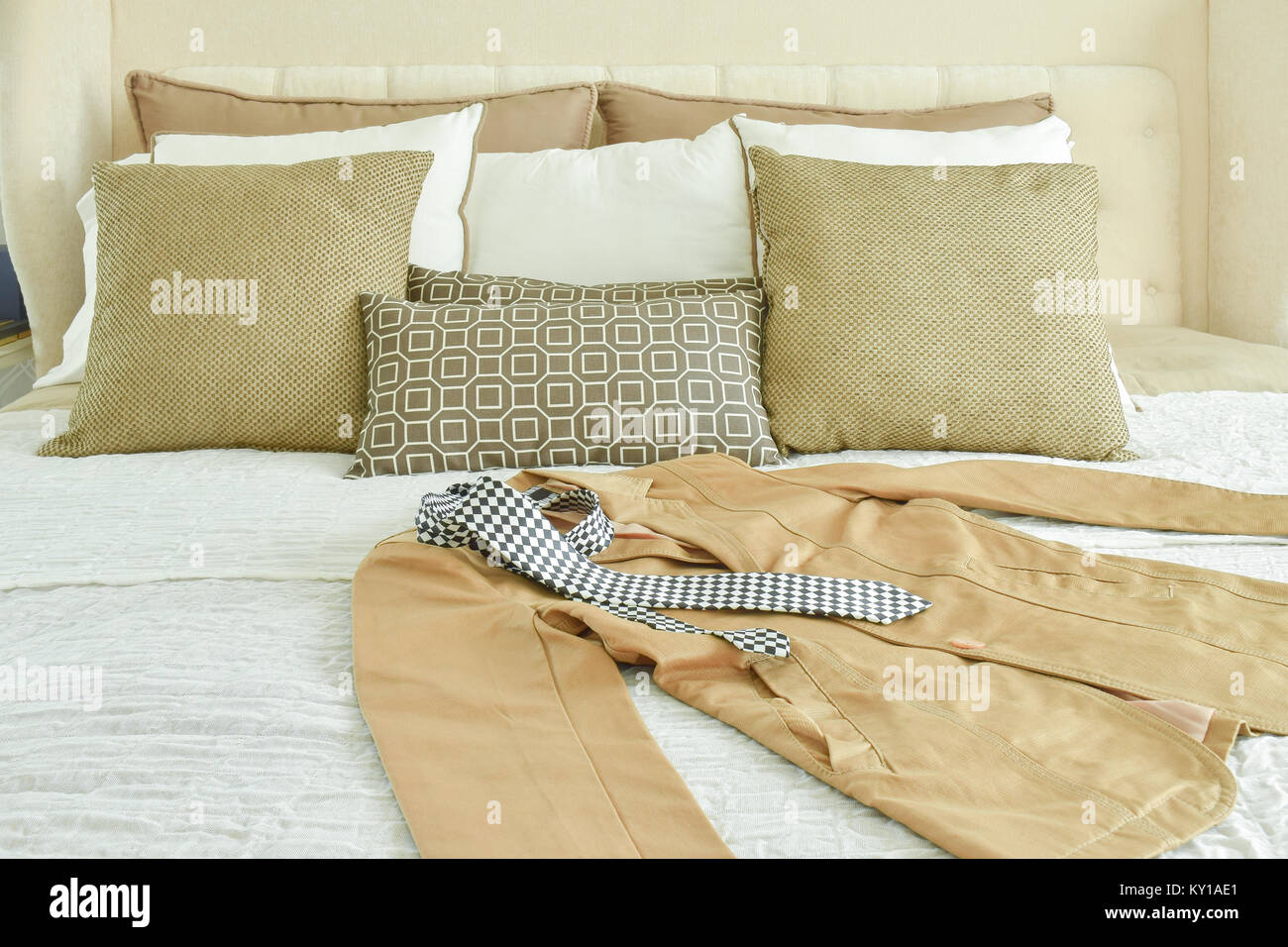 Suit tie on hotel bed hi-res stock photography and images - Alamy