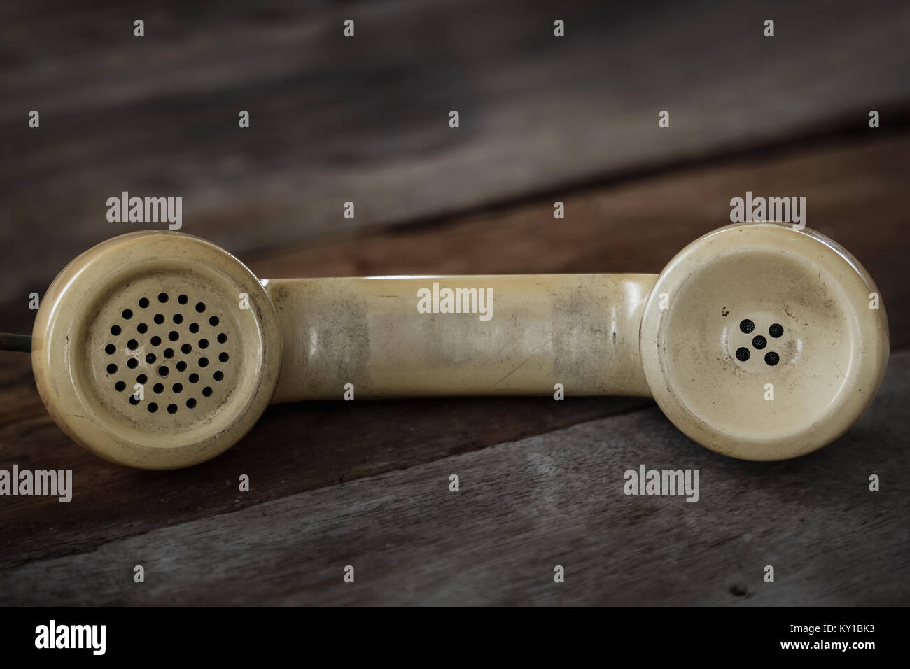 Vintage Telephone on an Old Wood Table Stock Photo - Alamy