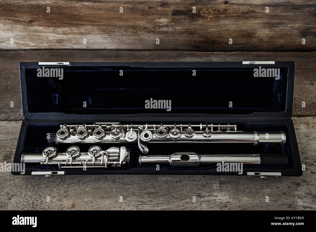 Modern Concert Flute on a Wood Table Stock Photo - Alamy