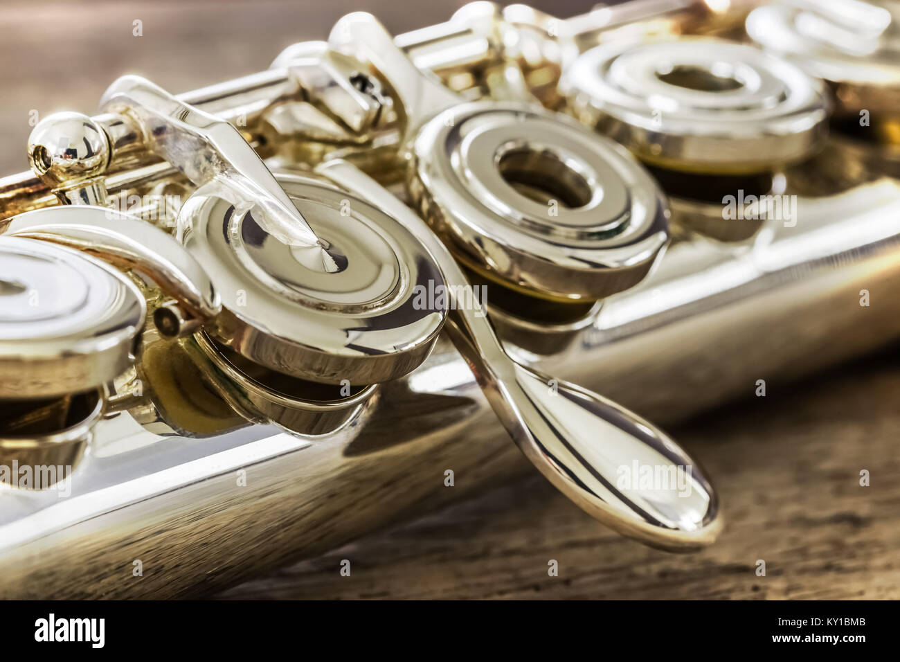 Modern Concert Flute on a Wood Table Stock Photo - Alamy