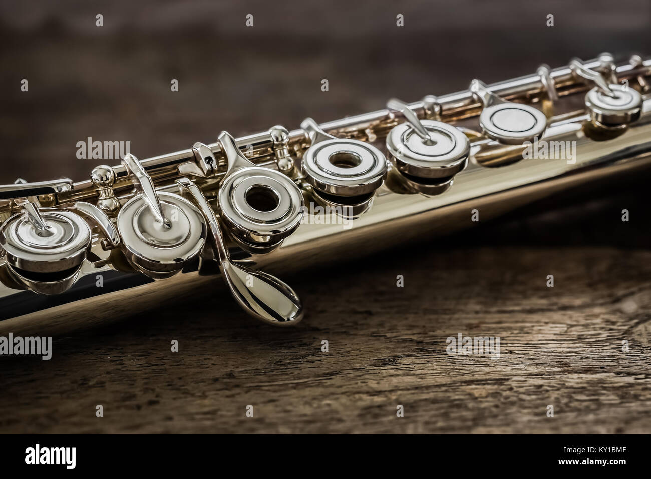 Modern Concert Flute on a Wood Table Stock Photo - Alamy