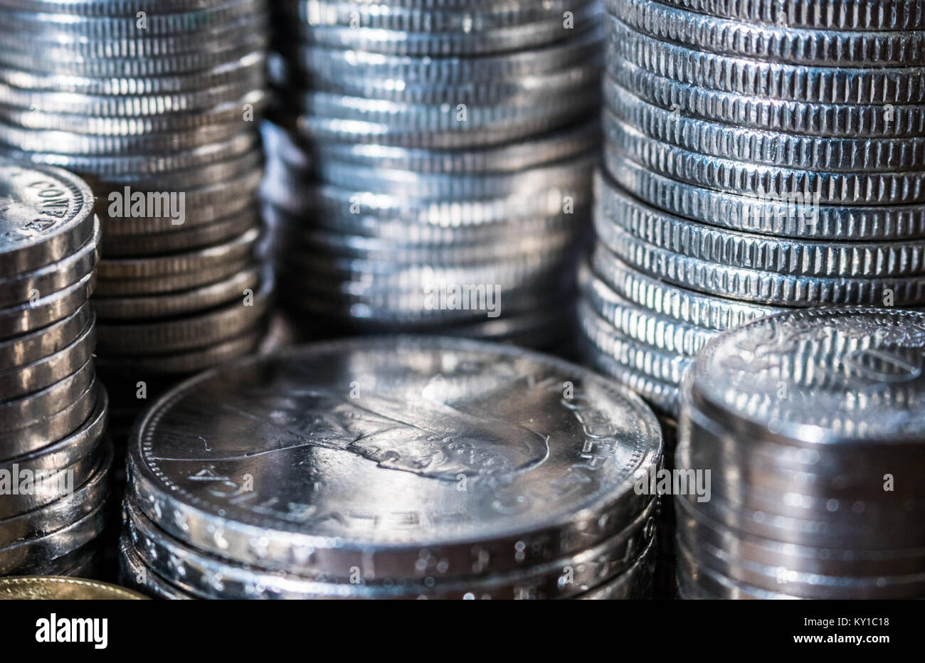 close up view of stacks of many Swiss franc coins in different ...