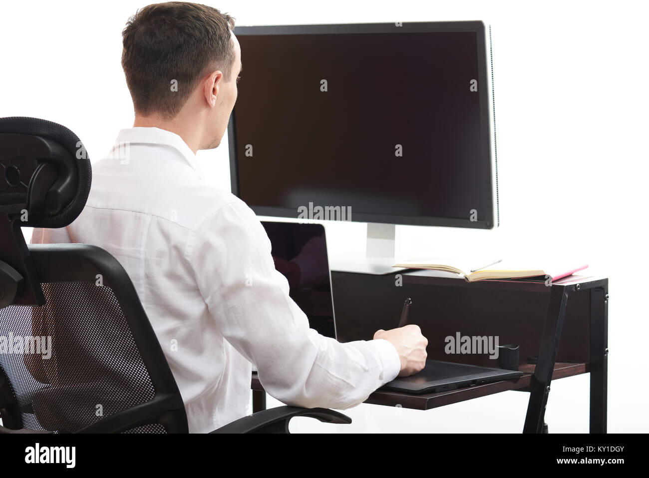 Graphic designer wotk on tablet in office background. Man making ...